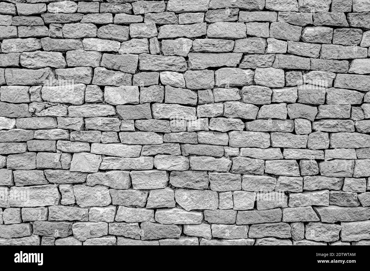 Gray stone wall as an abstract background Stock Photo - Alamy
