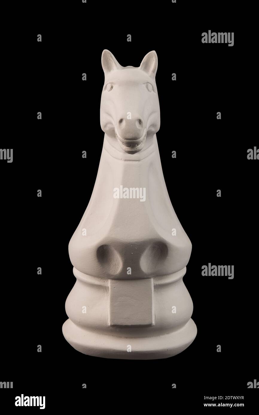 plaster figurine chess piece horse white background Stock Photo - Alamy