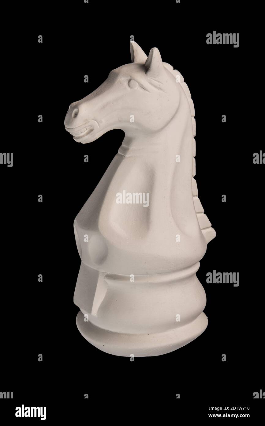 plaster figurine chess piece horse white background Stock Photo - Alamy
