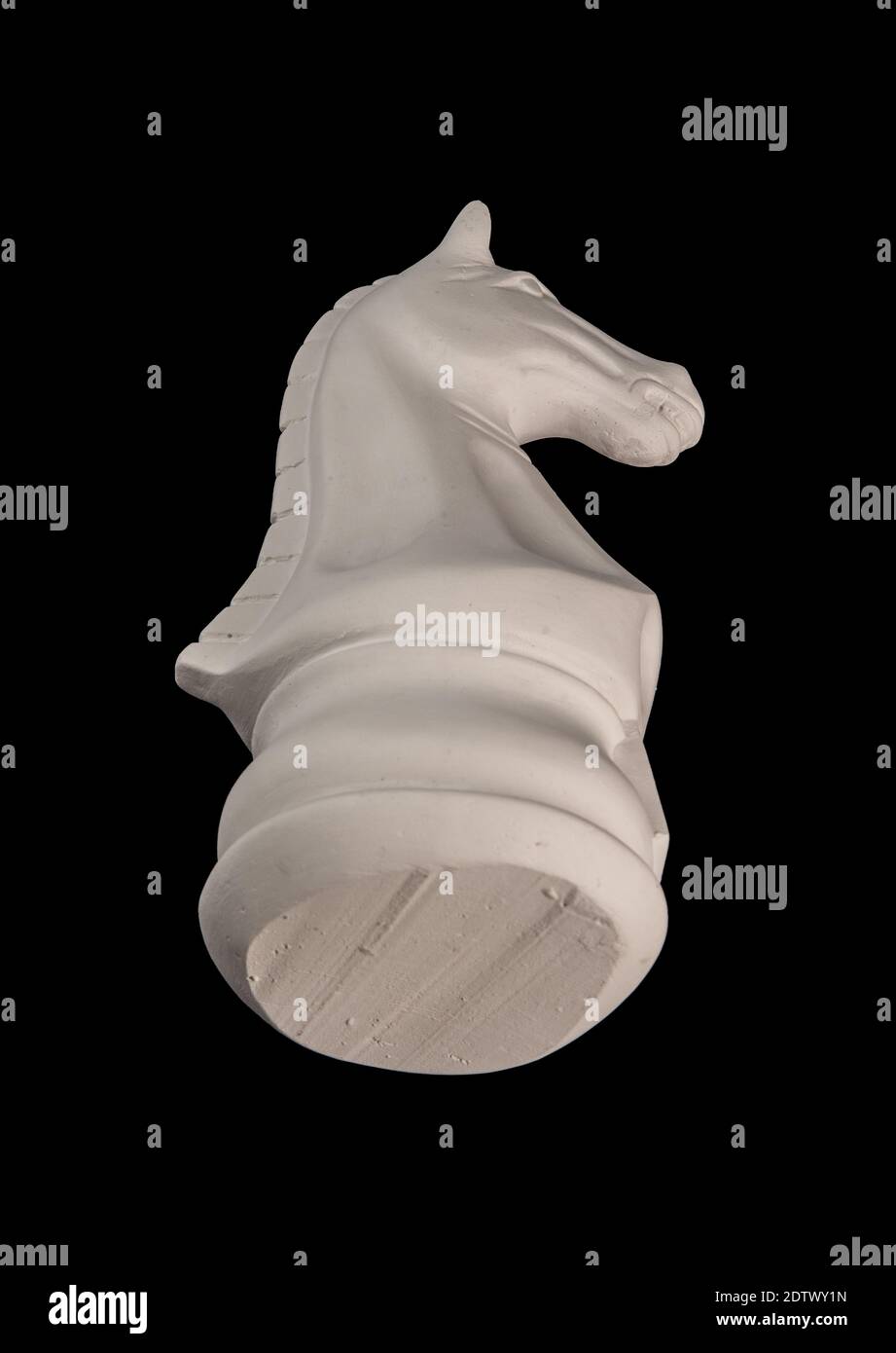 plaster figurine chess piece horse white background Stock Photo - Alamy