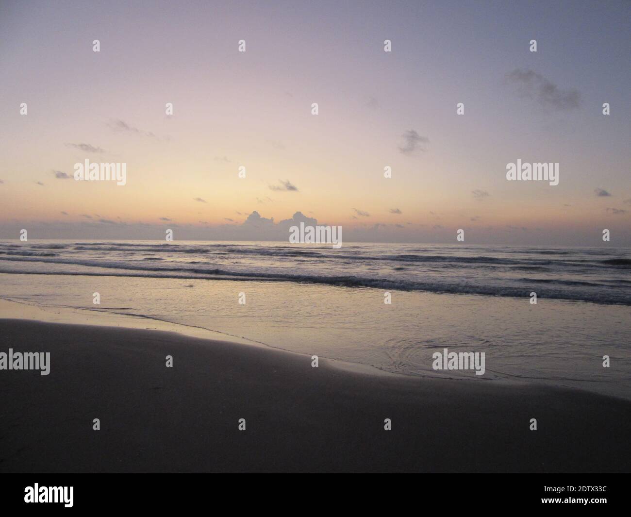Purple haze sunrise over Packery Channel Jetty, Padre Island, Texas ...