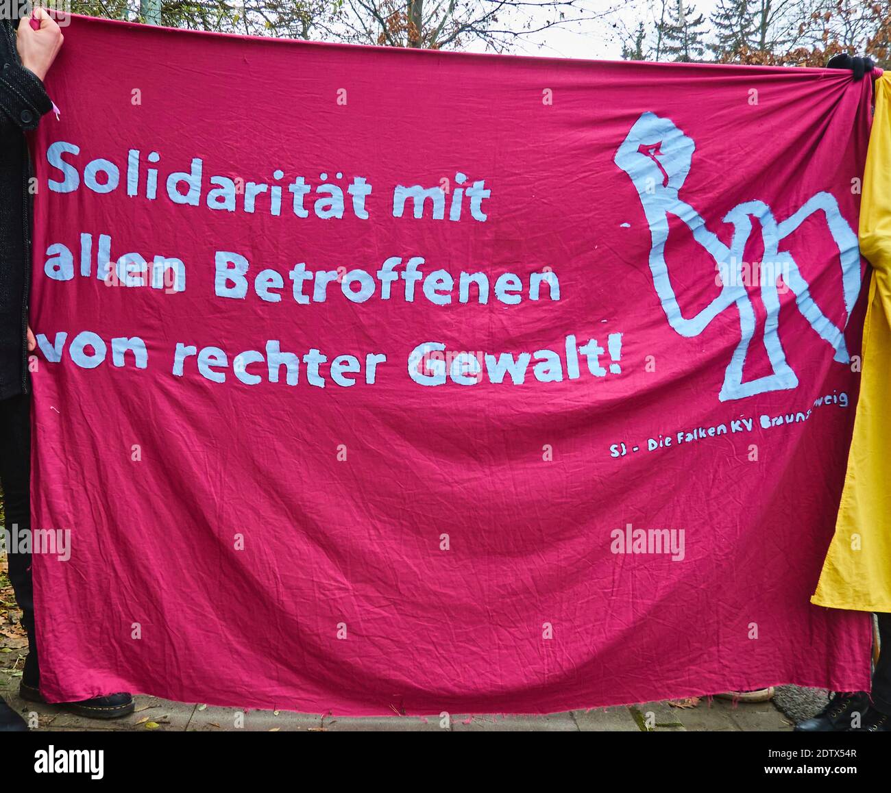 Red protest poster with a symbolic falcon and the German inscription ...