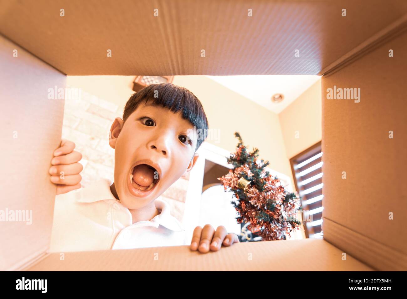 Child package delivery person hi-res stock photography and images - Alamy