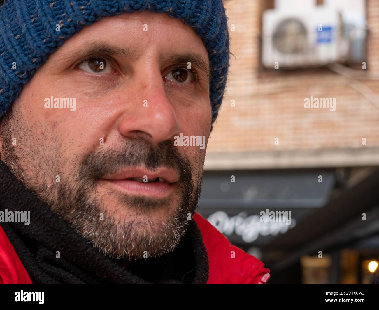 Man in red jacket hi-res stock photography and images - Alamy
