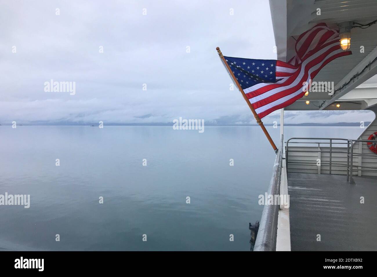 American flag waving on ship hi-res stock photography and images - Alamy