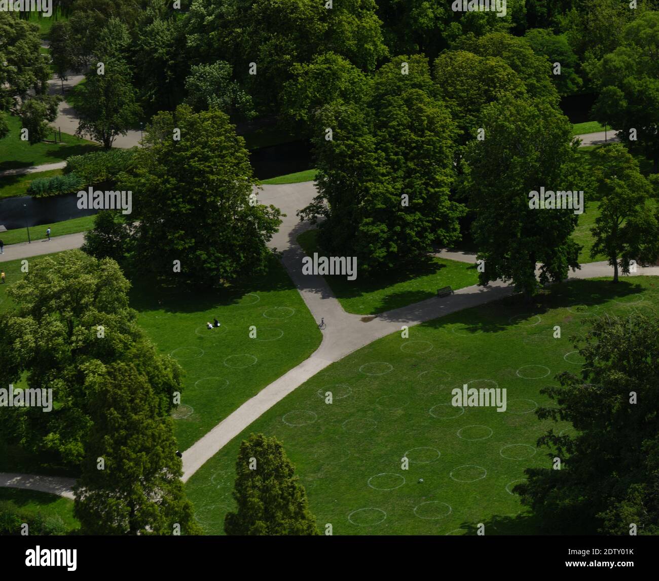 A drone view of the Het Park covered in greenery under the sunlight in ...