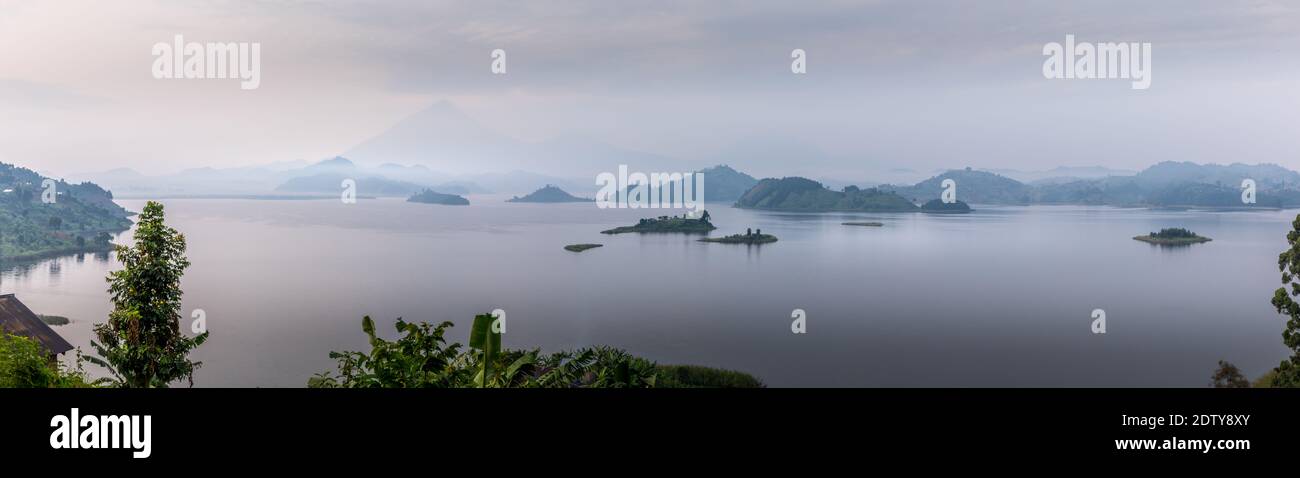 Panorama of Lake Mutanda at morning with view on the volcanoes mount ...