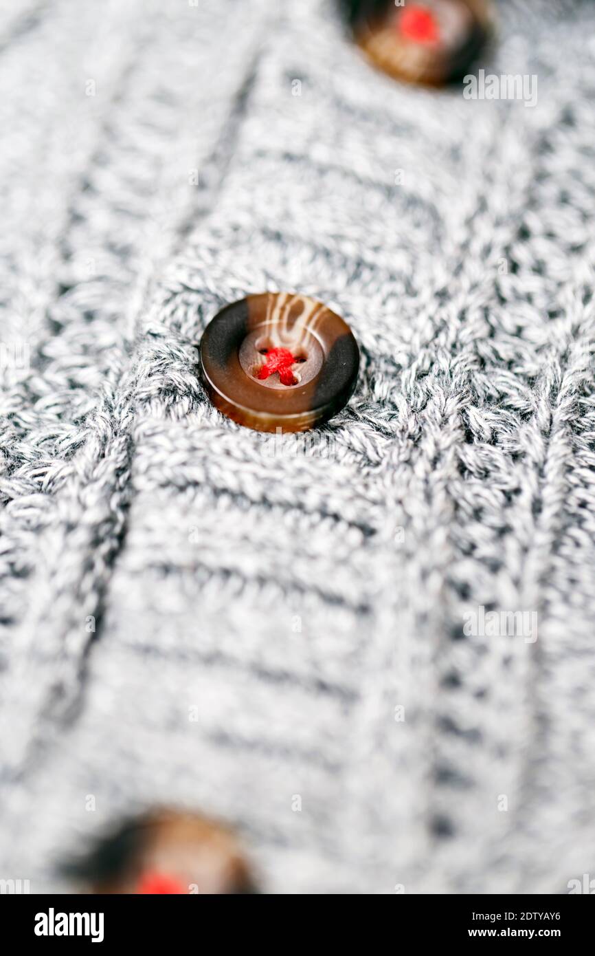 Sweater buttons hi-res stock photography and images - Alamy