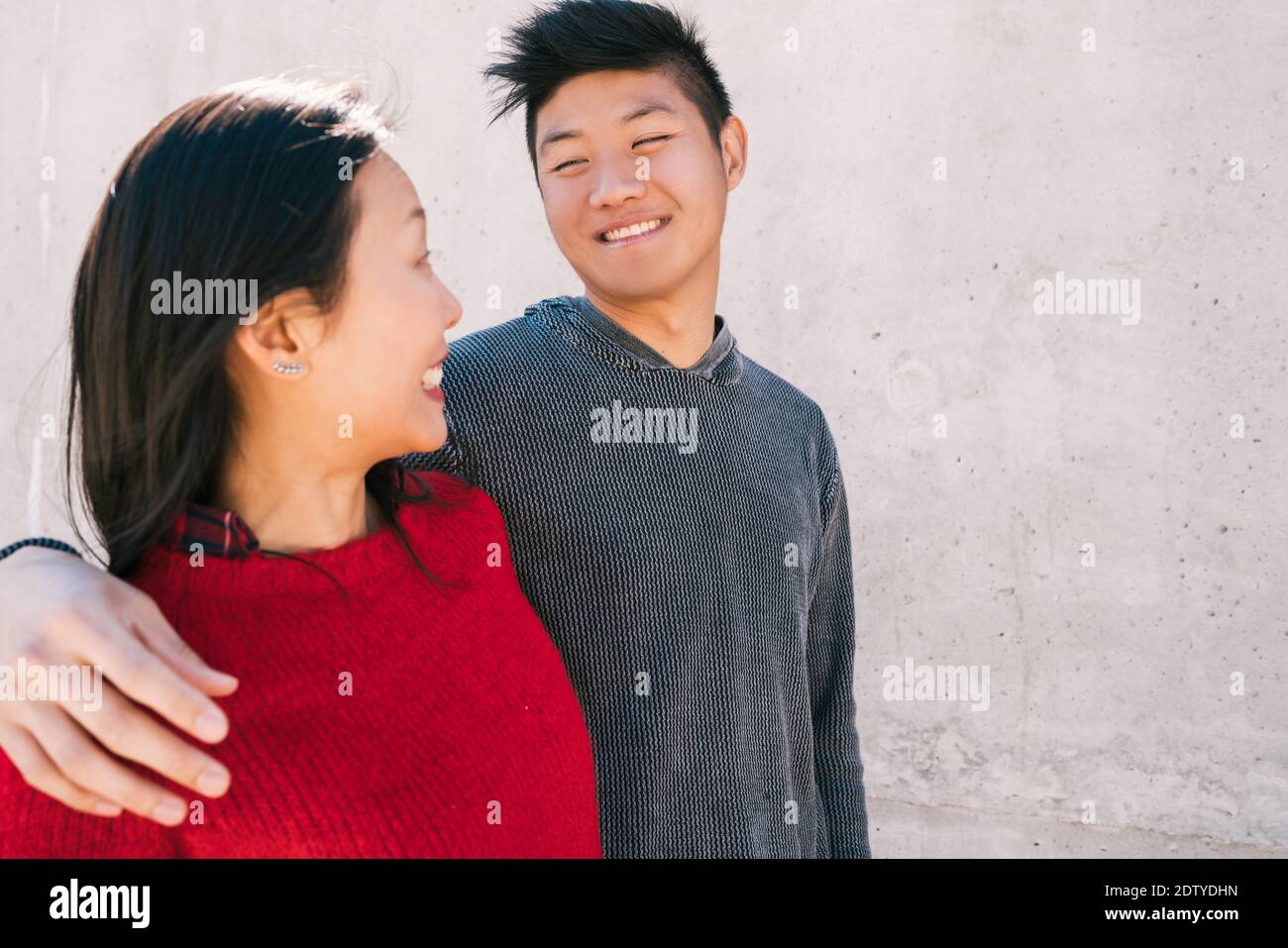 Asian couple having good time together Stock Photo - Alamy