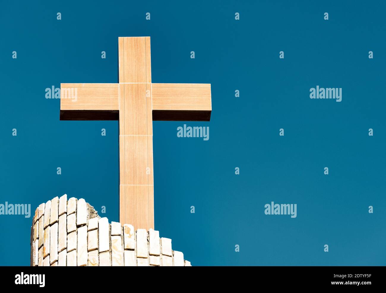 Christian cross symbol on top of church in a blue sky daytime Stock ...