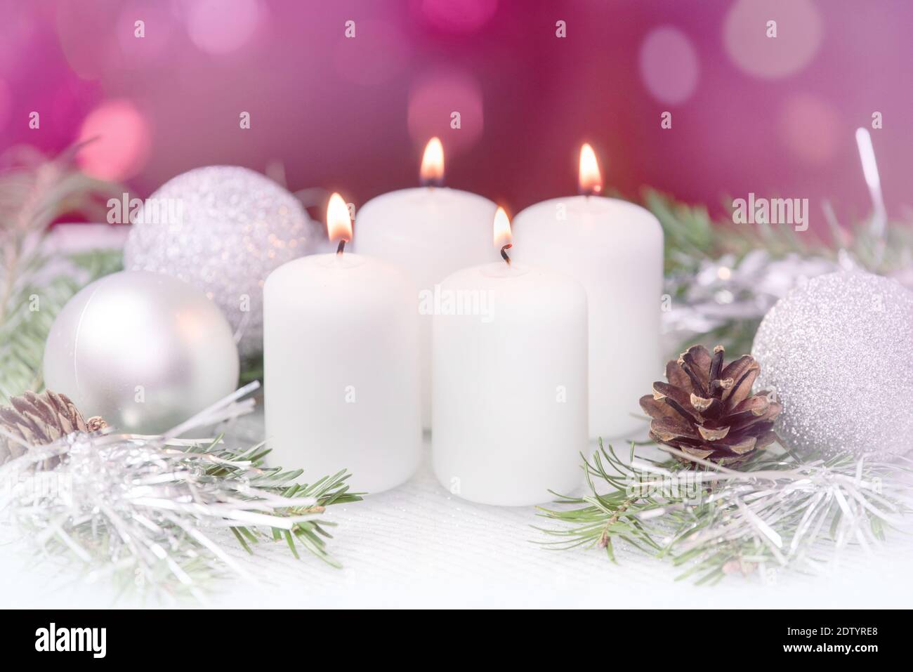 White Christmas candles. Holiday. Christmas decoration. Fir branches ...