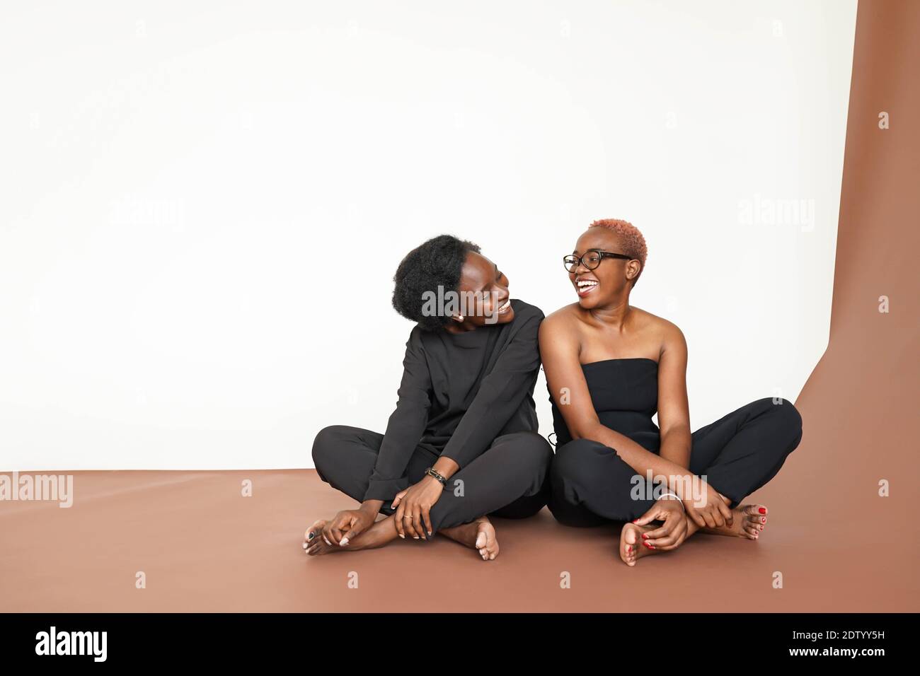 Nigerian women and laugh hi-res stock photography and images - Alamy