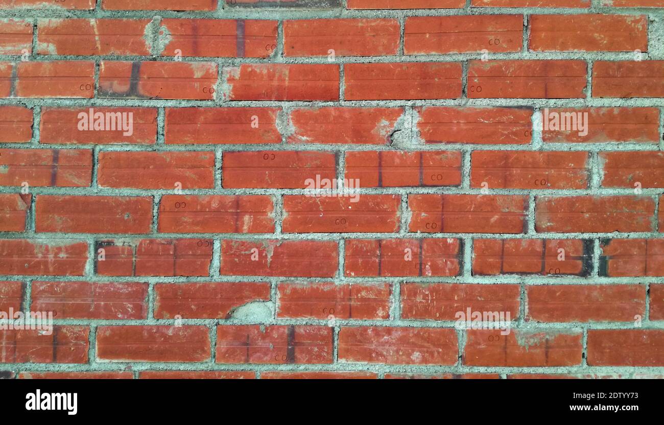 A closeup of a rough brick wall of a building under Stock Photo - Alamy