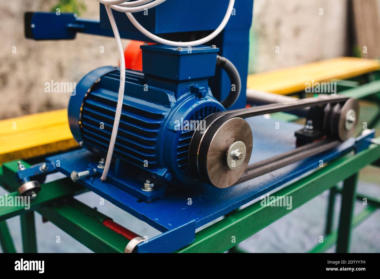 wood cutting machine. Close up electric circular saw cutting wood and ...