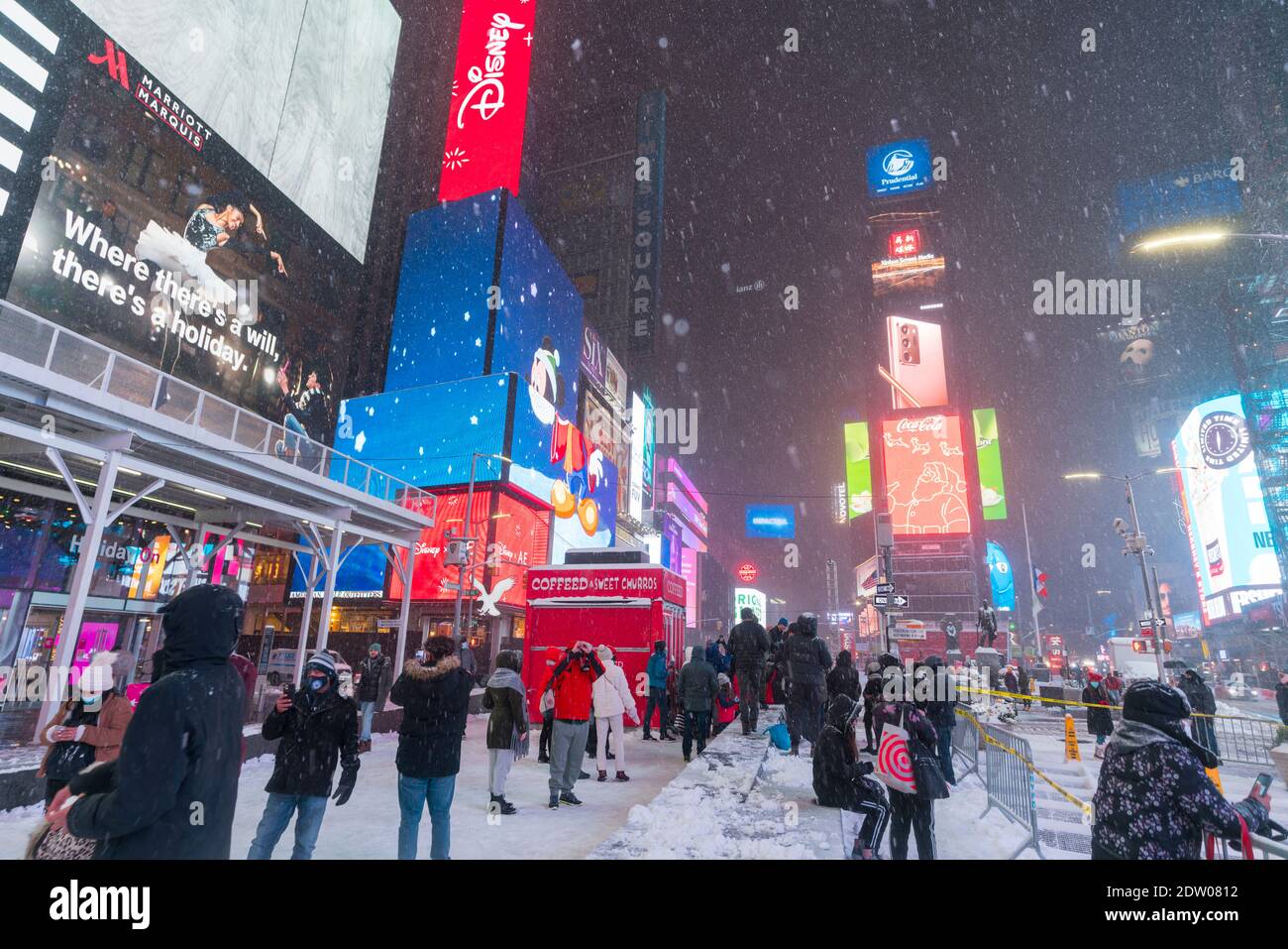 Tourists and visitors enjoy during the First winter storm hits in Times ...