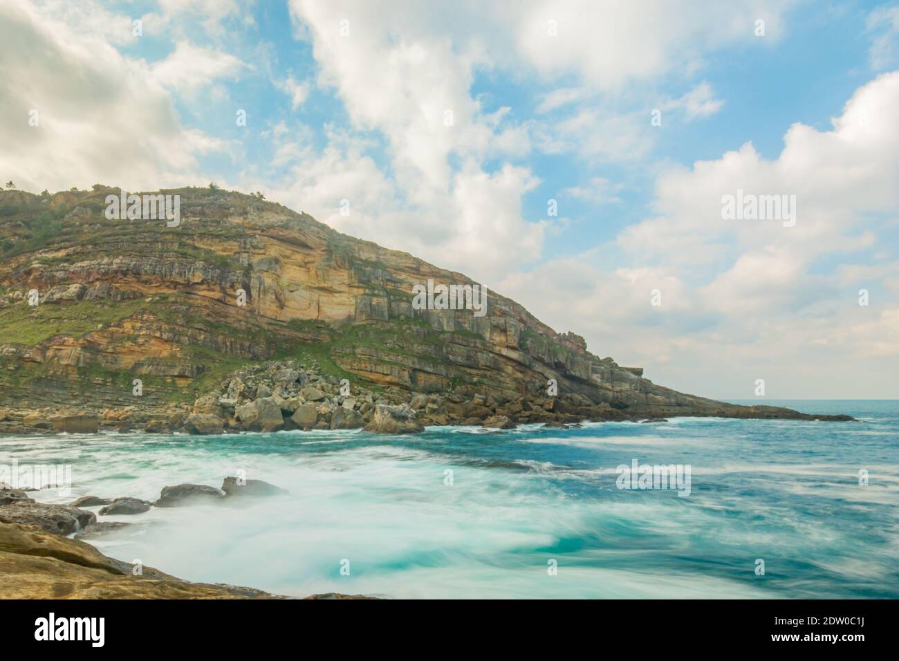 Rough seascape with rocks and waves Stock Photo - Alamy
