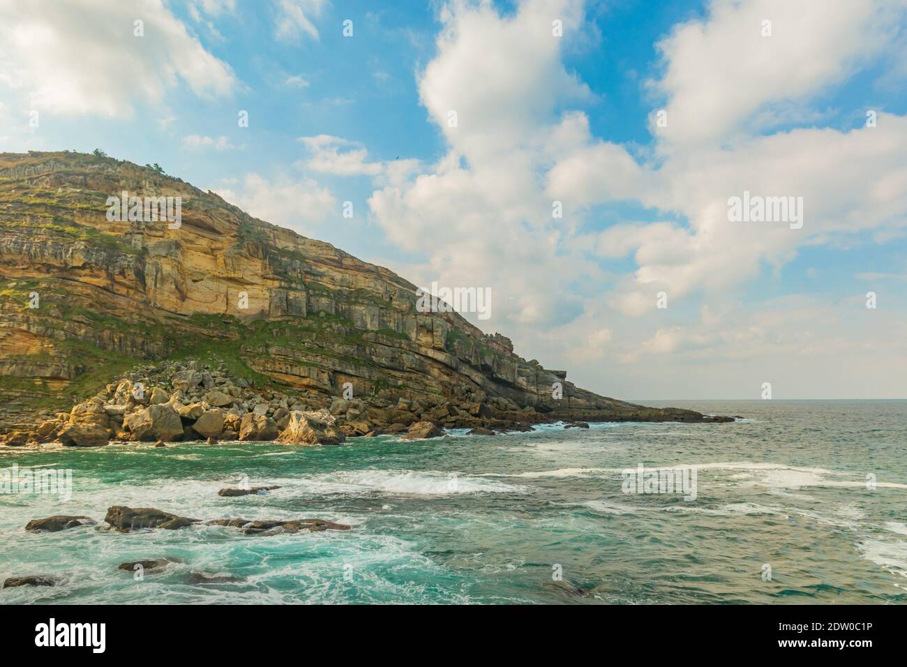 Rough seascape with rocks and waves Stock Photo - Alamy