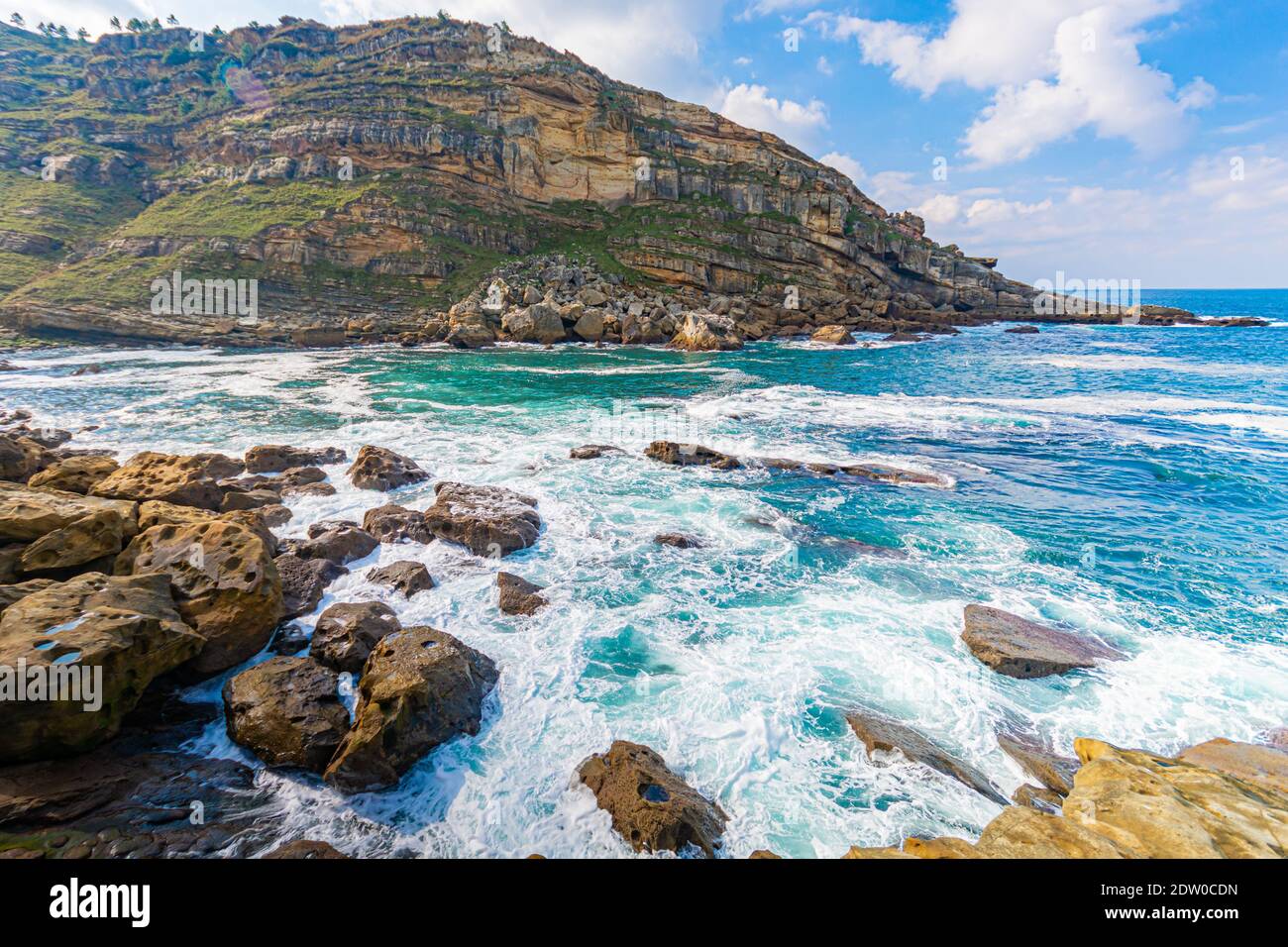 Rough seascape with rocks and waves Stock Photo - Alamy