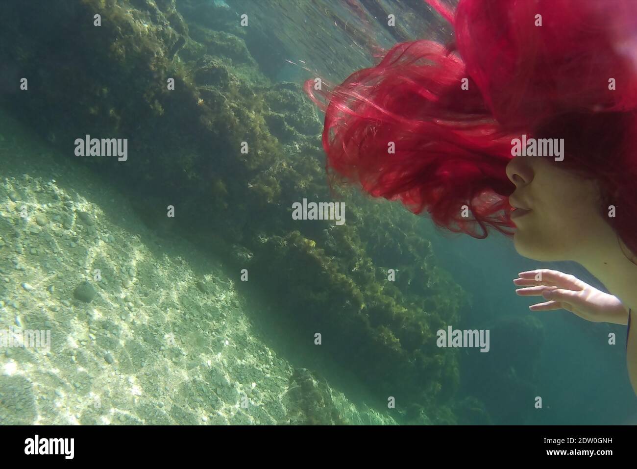Woman Swimming Sea Red Hair High Resolution Stock Photography and ...
