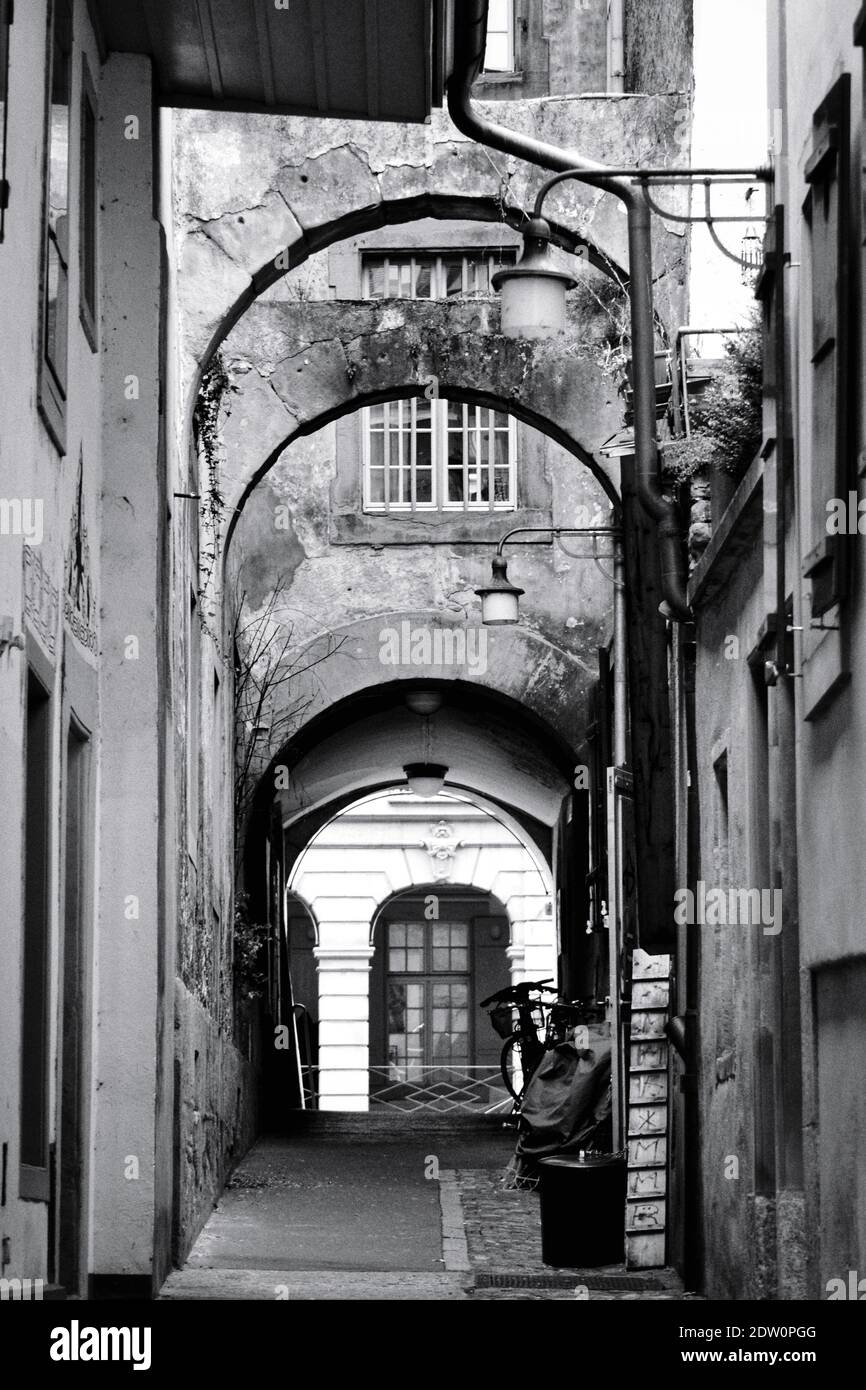 Narrow Alley Amidst Old Buildings In City Stock Photo - Alamy