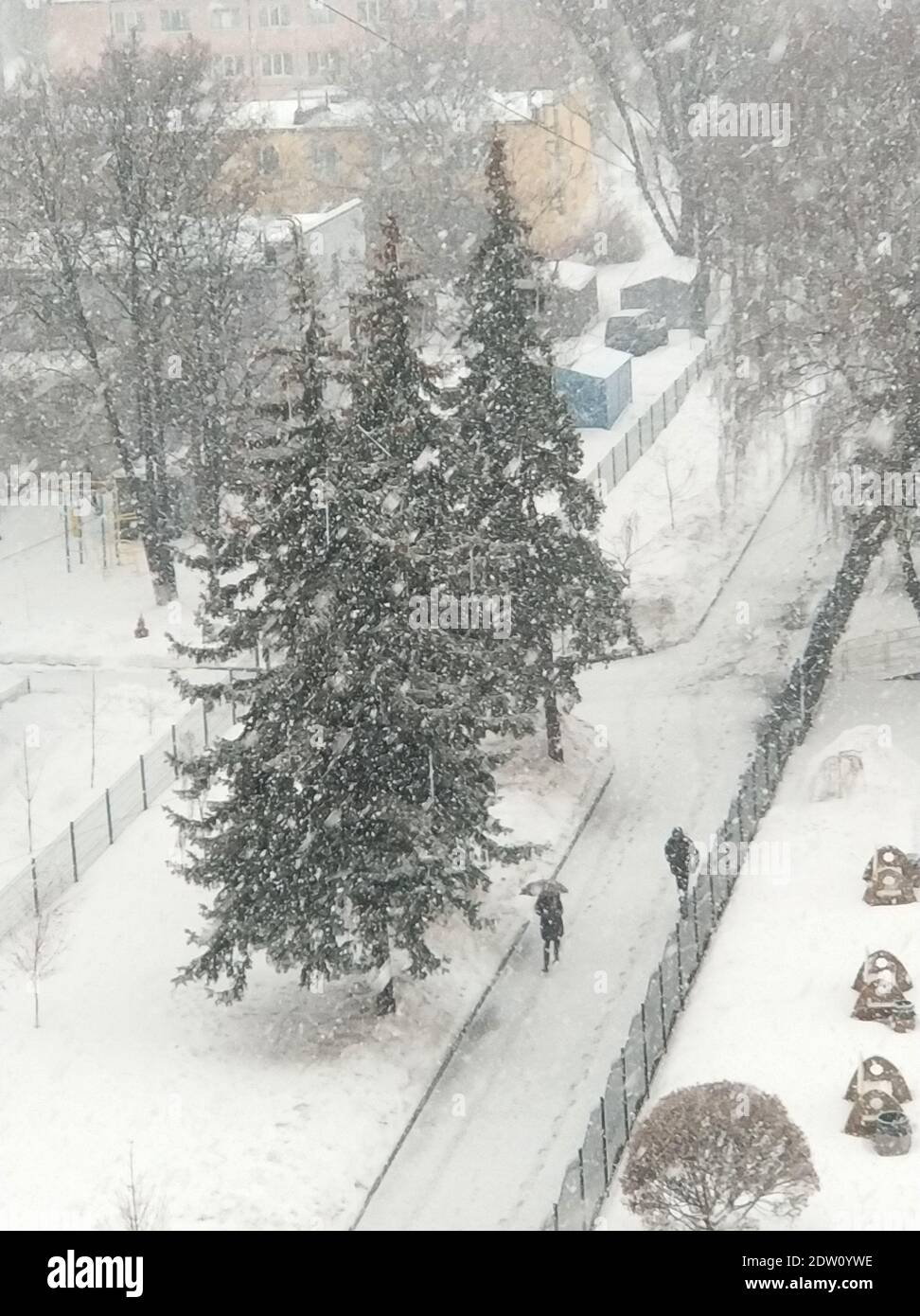Winter landscape. The streets of a small town are covered with white ...