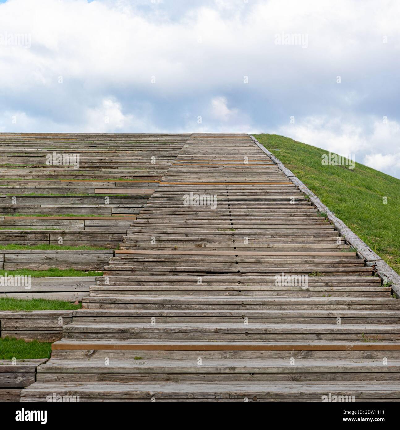 Wooden bleachers with public park space Stock Photo - Alamy