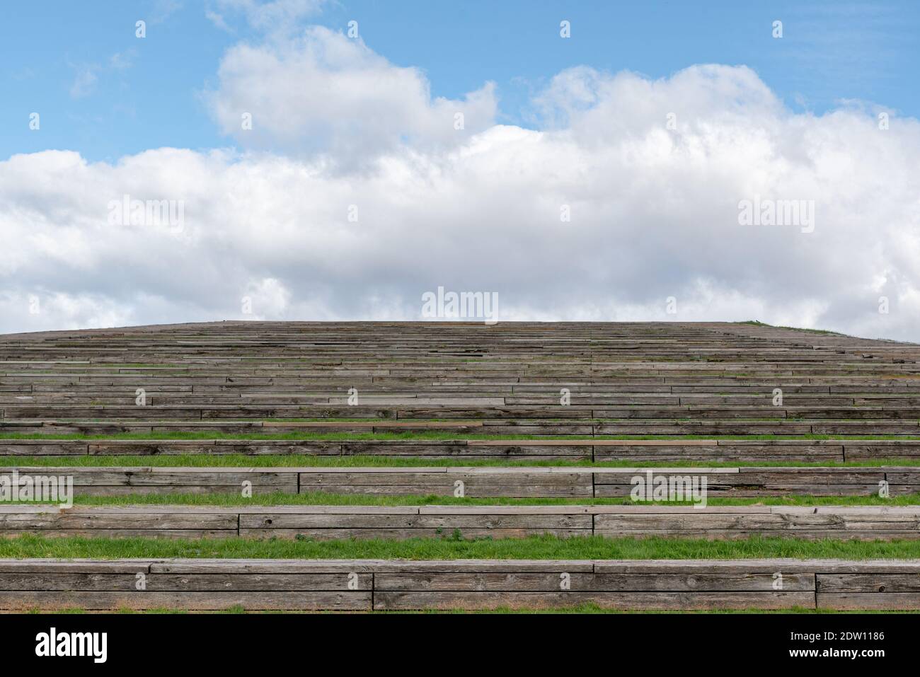 Wooden bleachers with public park space Stock Photo - Alamy