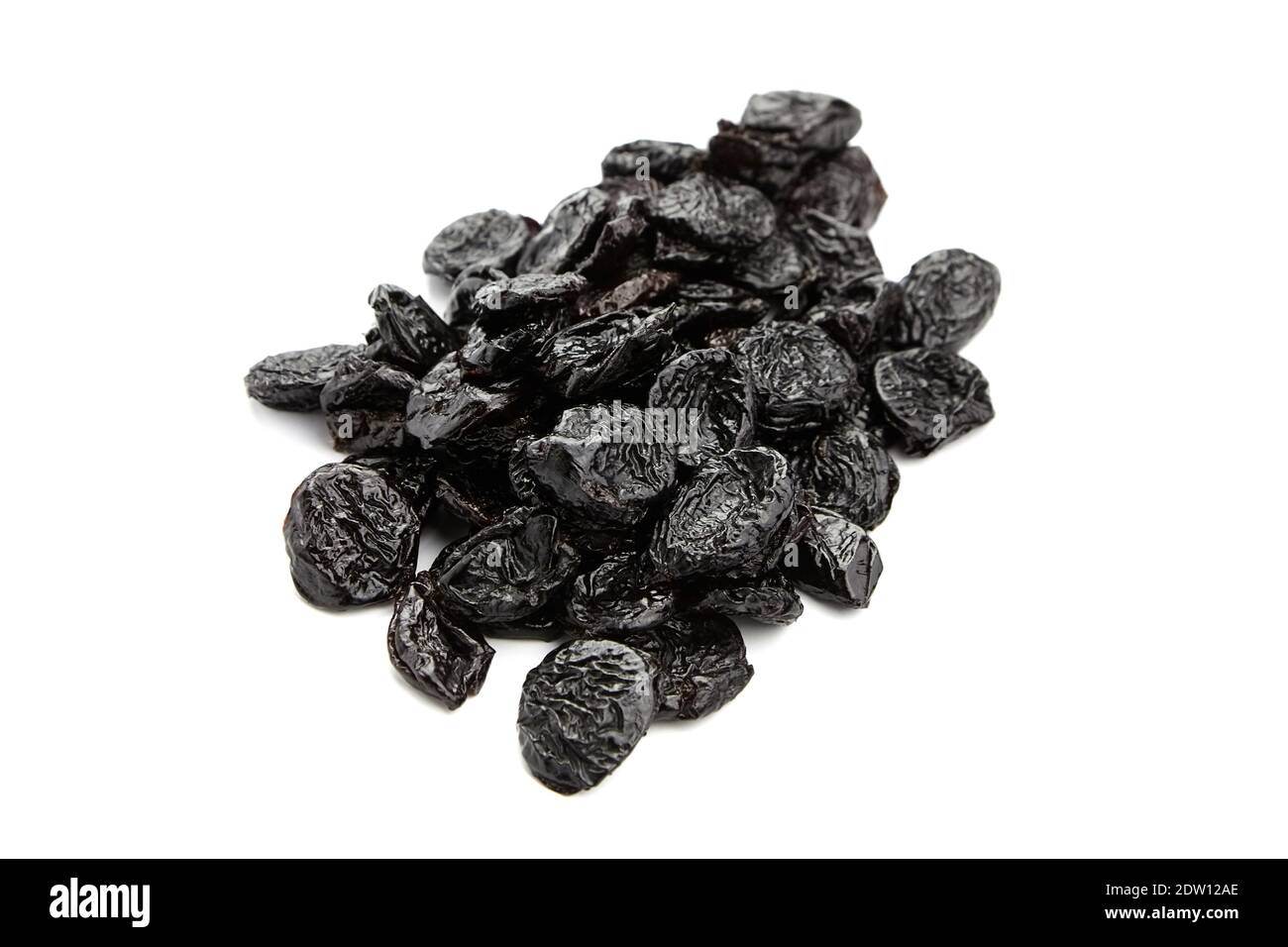 Prunes, dry plums isolated on white background. Heap of dried fruits ...