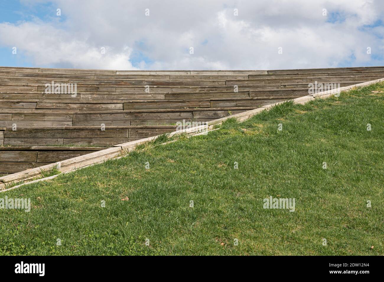 Wooden bleachers with public park space Stock Photo - Alamy