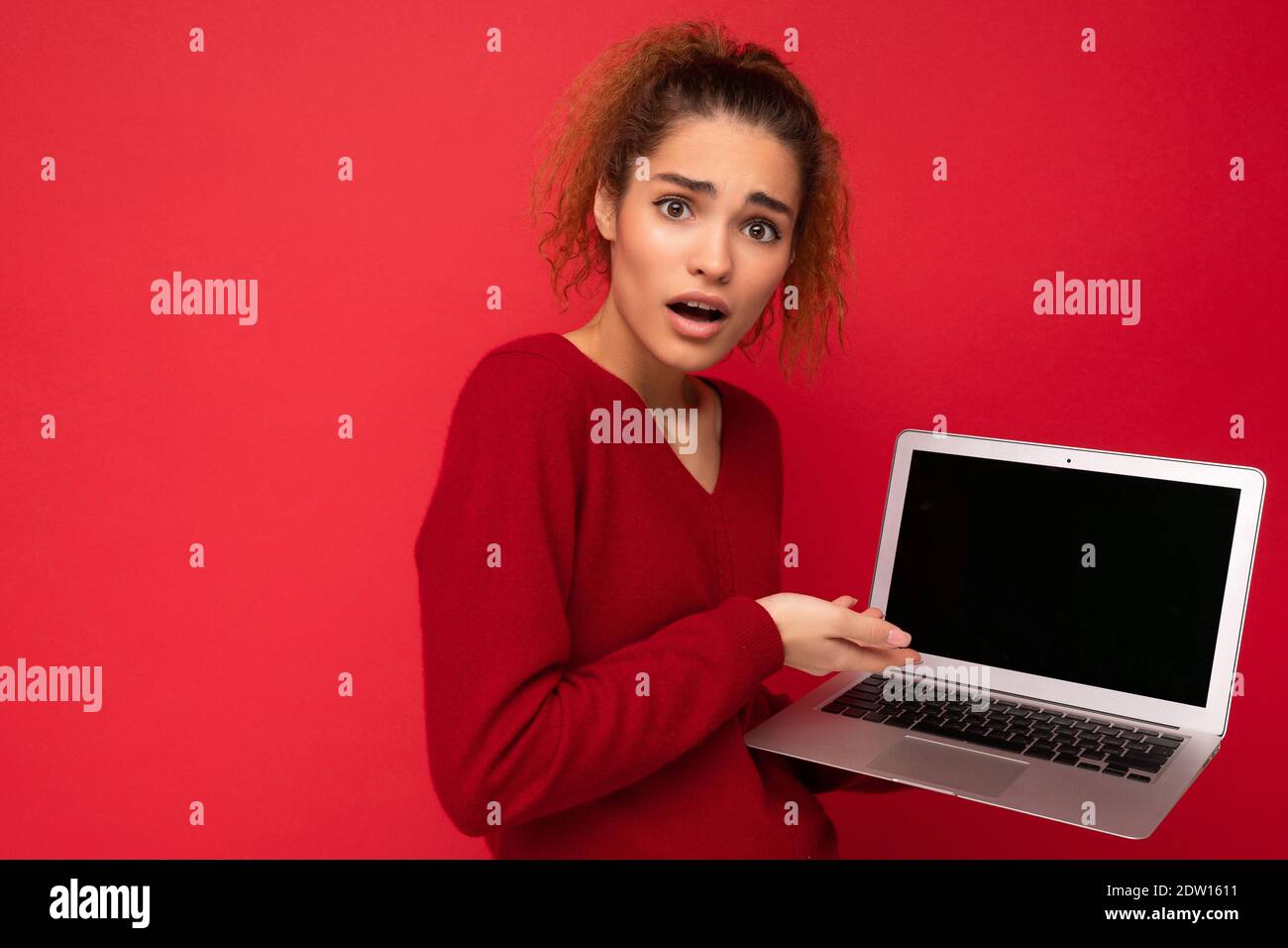 Close-up portrait of beautiful amazed surprised astonished dark blond ...