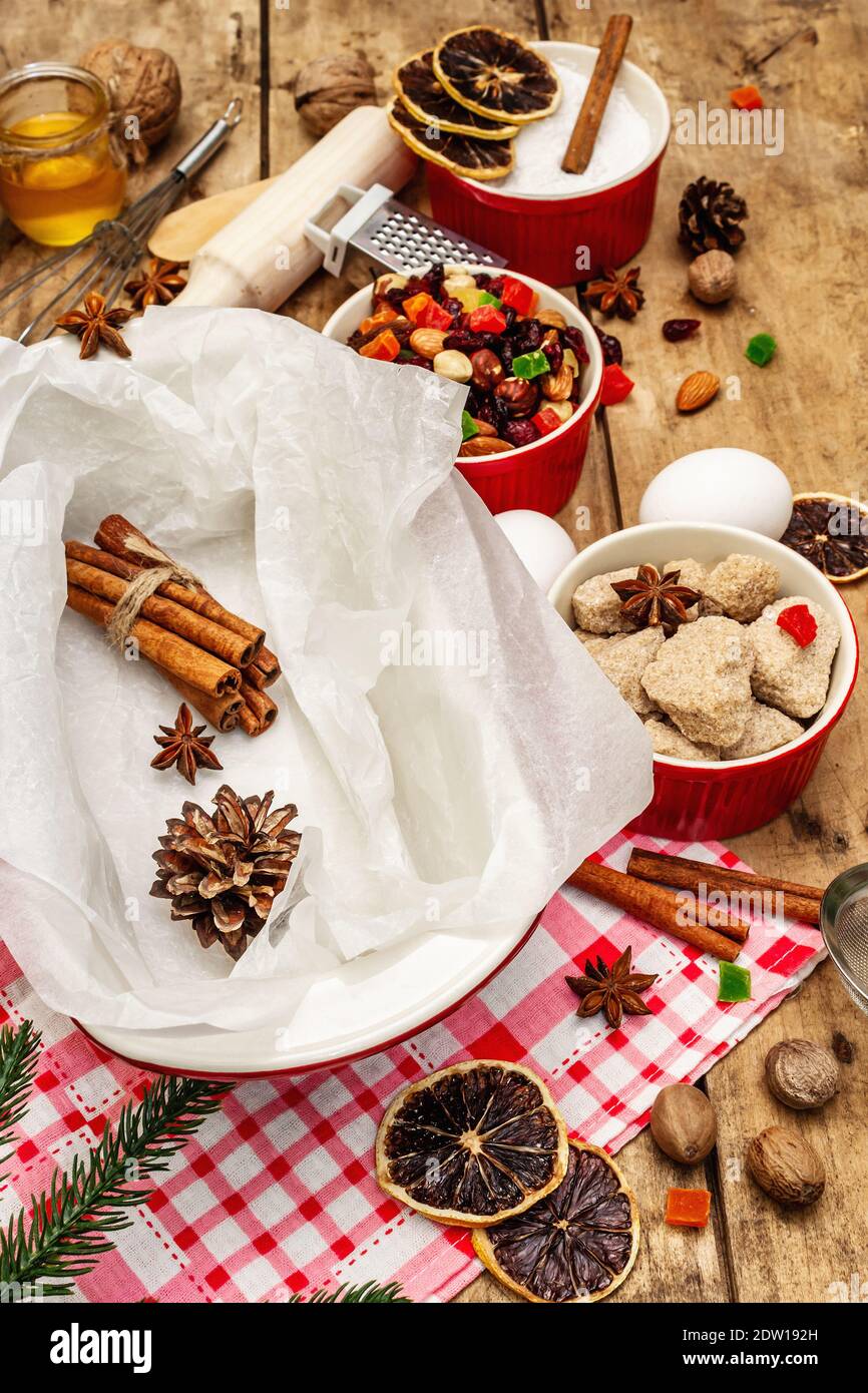 Christmas baking background 2021. Traditional Saxon Stollen with fruits ...