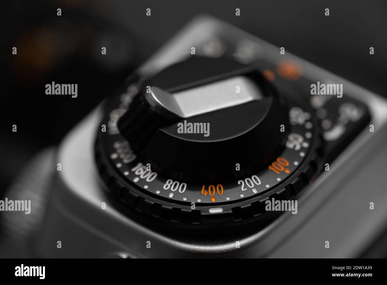 Film speed indicator knob of retro camera Stock Photo - Alamy