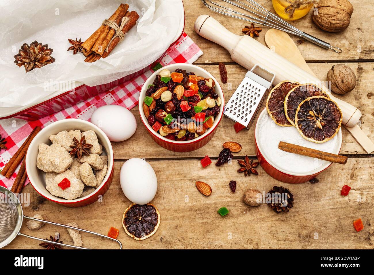 Christmas baking background 2021. Traditional Saxon Stollen with fruits ...