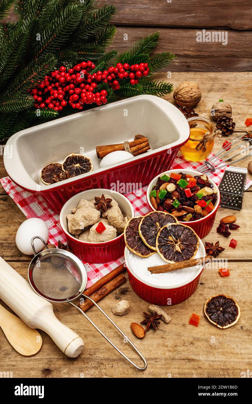 Christmas baking background 2021. Traditional Saxon Stollen with fruits ...