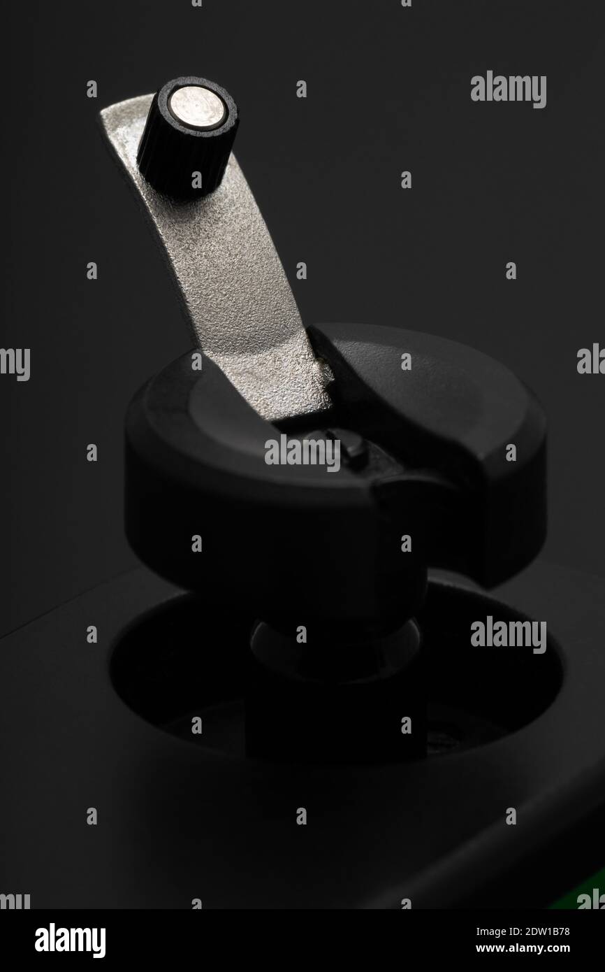 Rewind crank of a black retro film camera Stock Photo - Alamy