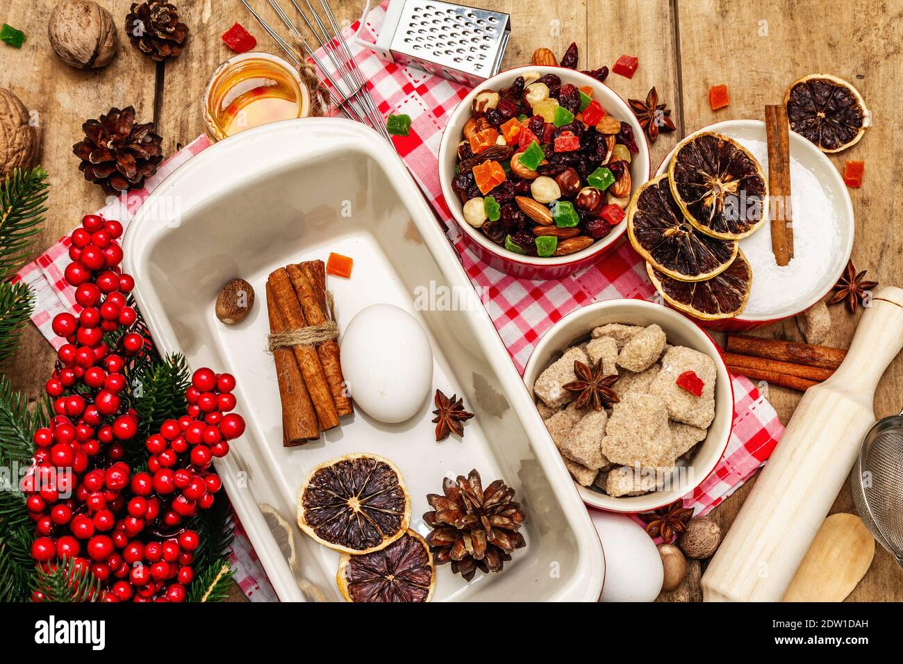Christmas baking background 2021. Traditional Saxon Stollen with fruits ...