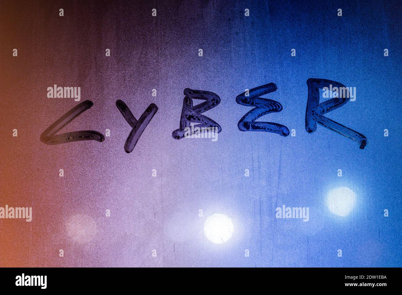 the word cyber handwritten on night wet glass surface Stock Photo - Alamy
