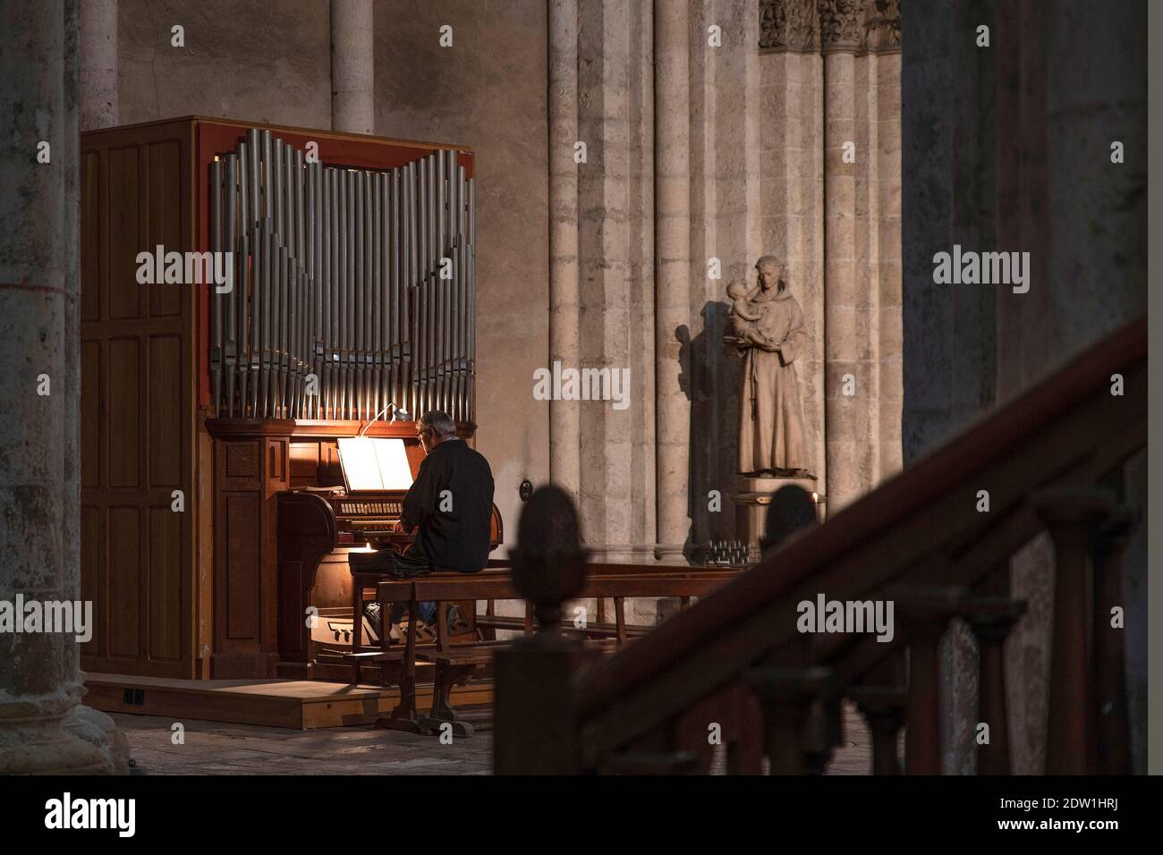 A man plays the organ in a church Stock Photo - Alamy