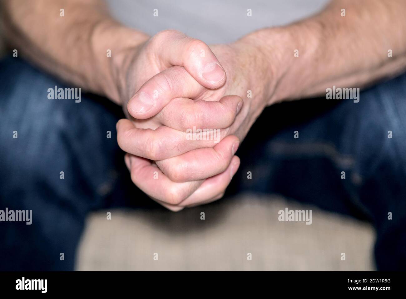 Intertwined fingers hi-res stock photography and images - Alamy