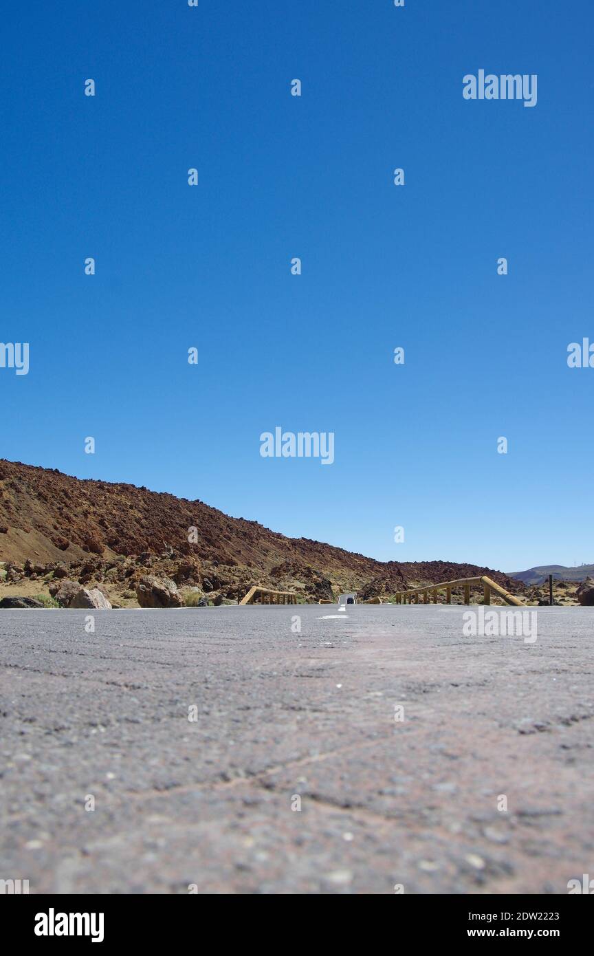 Road into the blue Stock Photo - Alamy