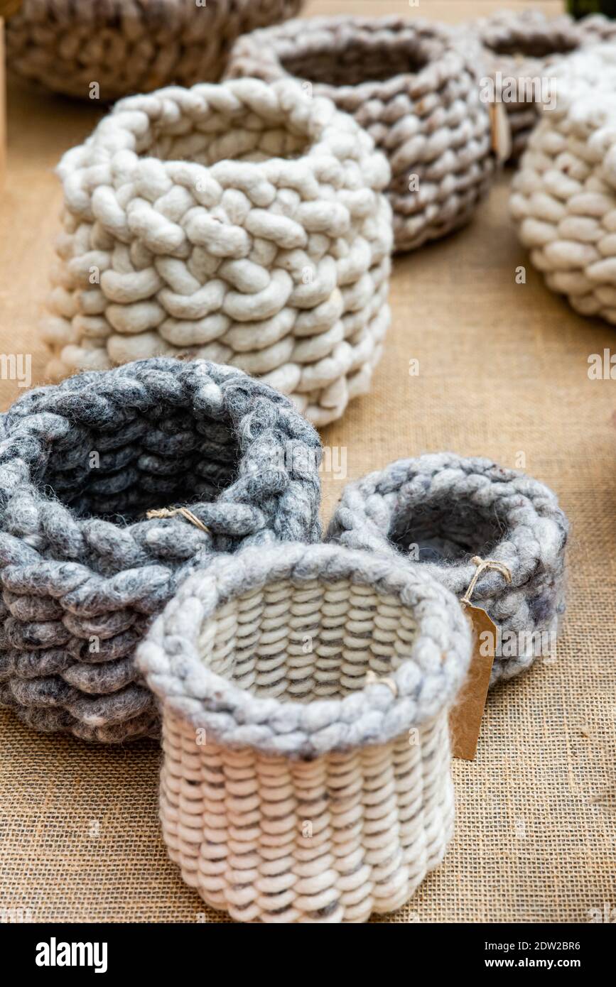 Handmade crocheted sheep wool baskets Stock Photo - Alamy