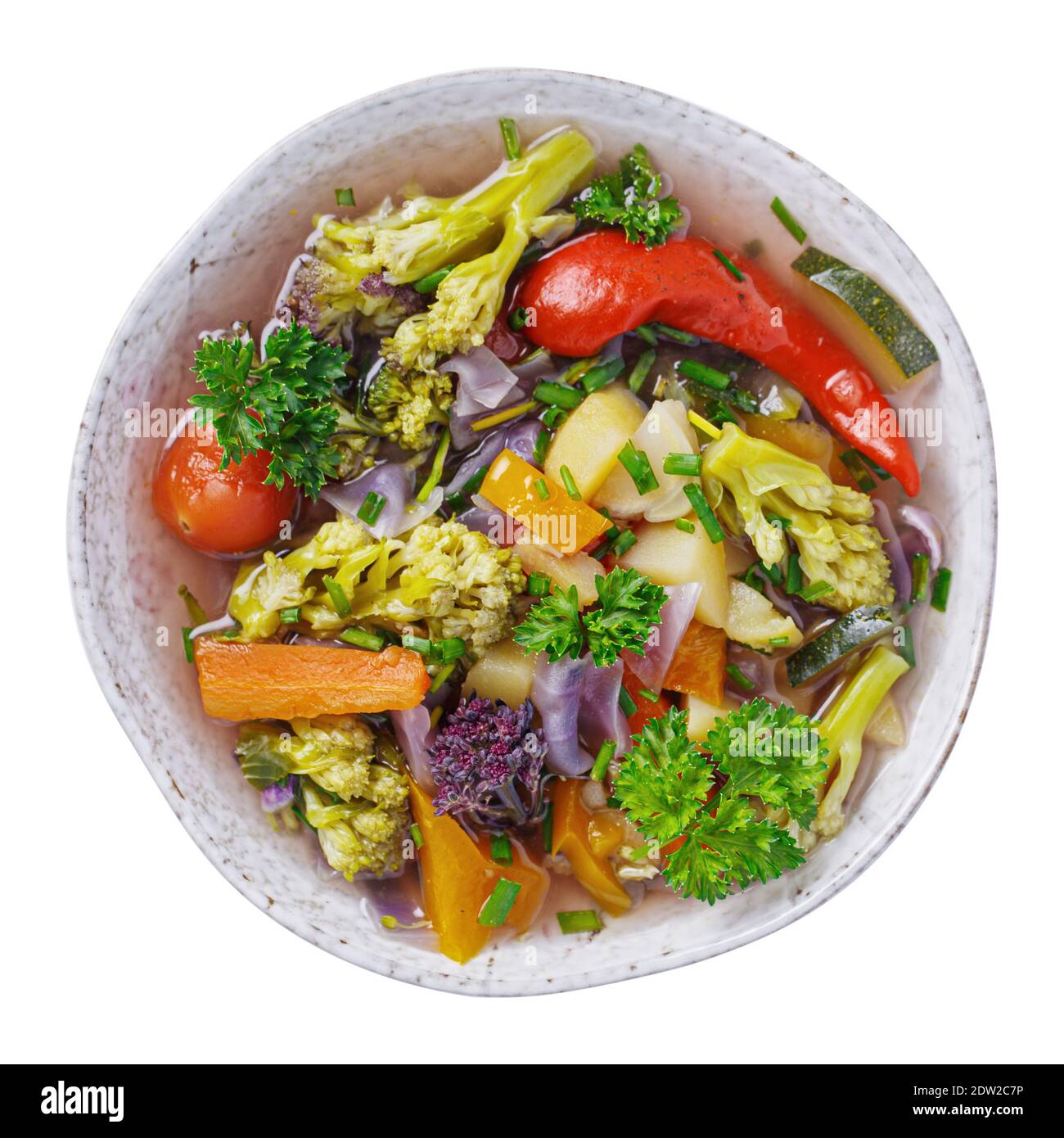 Stewed vegetables in plate top view, isolated on white Stock Photo - Alamy