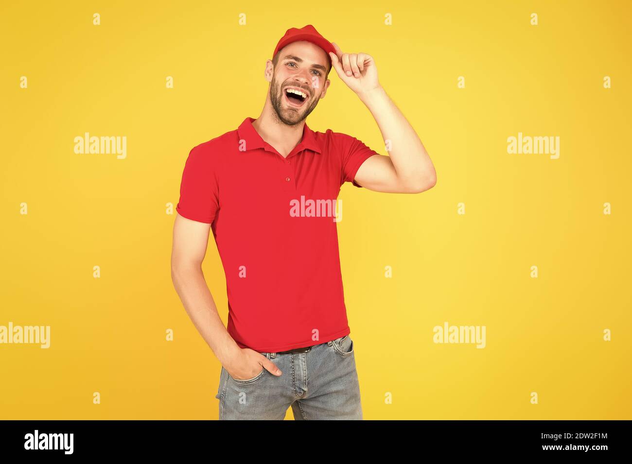 Staff wanted. Supermarket cashier. Man delivery service wear red cap ...
