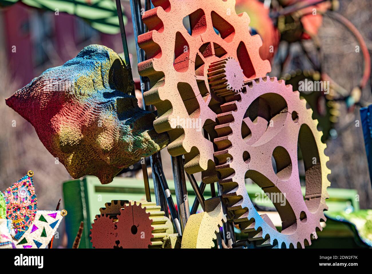 Machine rotary mechanism with colored gears Stock Photo - Alamy
