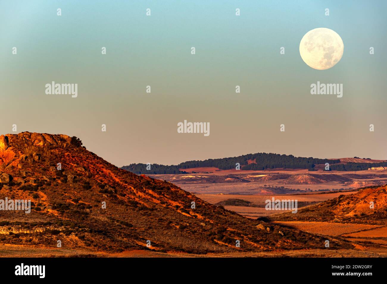 Nightfall with a full moon Stock Photo - Alamy