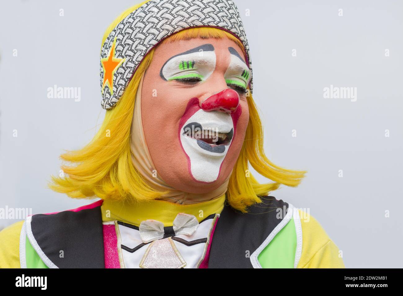 isolated portrait of one latin american joyful smiling comic clown ...
