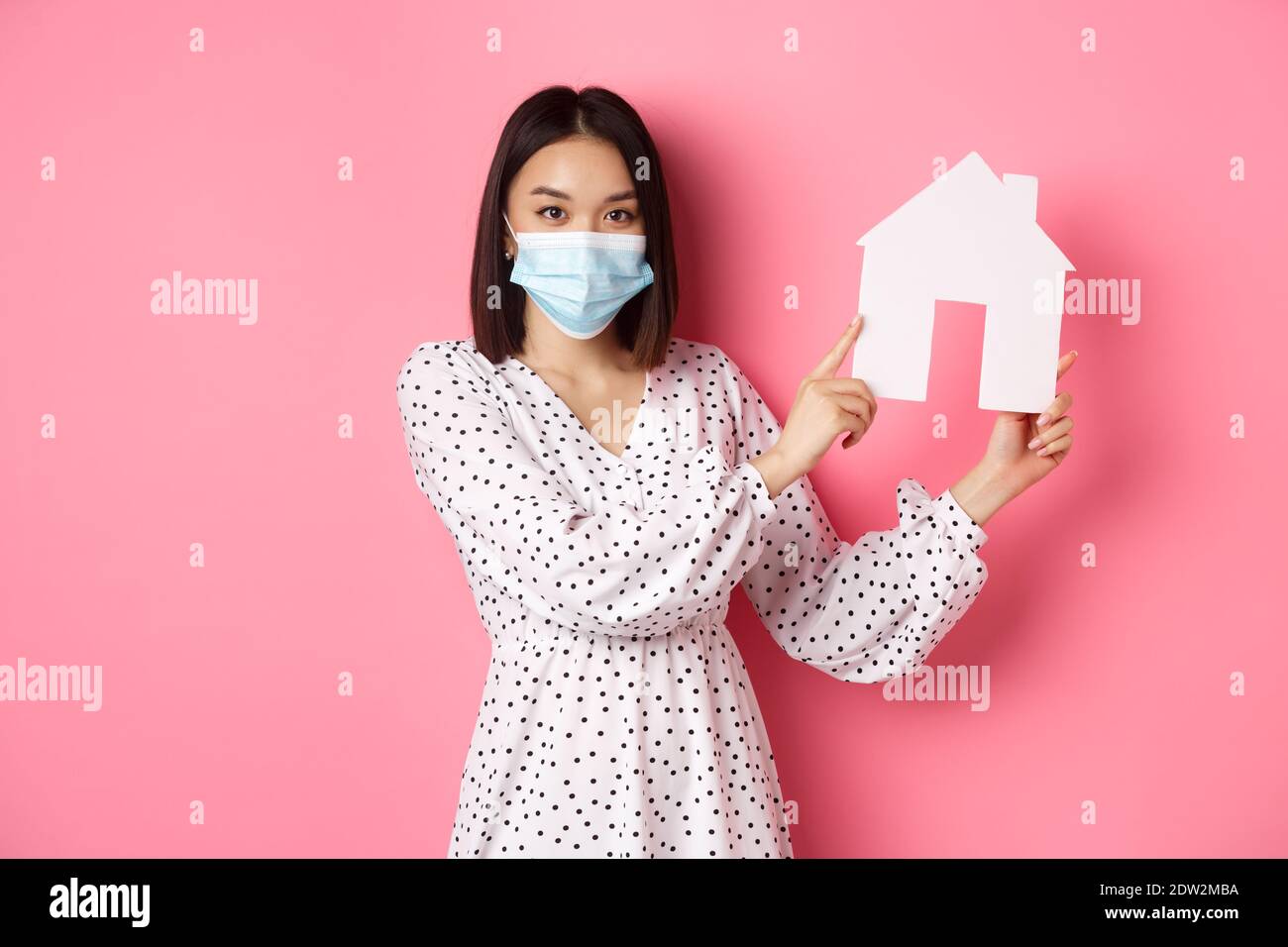 Covid-19, real estate and lifestyle concept. Cute asian woman in face ...