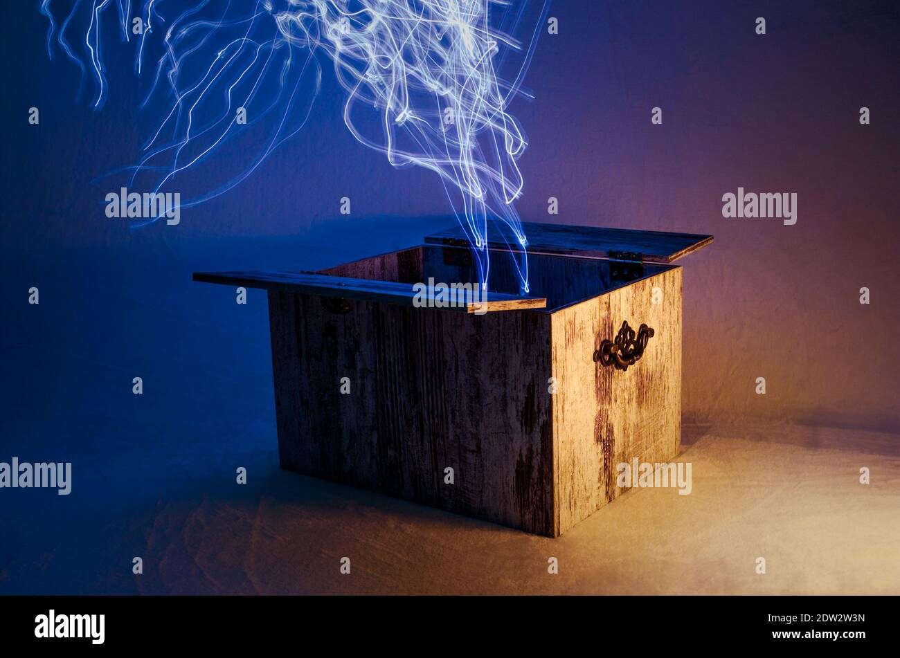 Magic wooden vintage hand crafted chest box open with streams of smoky ...