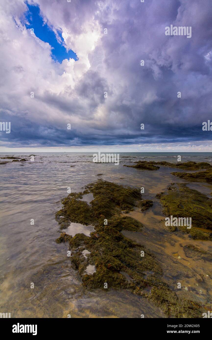 Rain in distance over ocean hi-res stock photography and images - Alamy