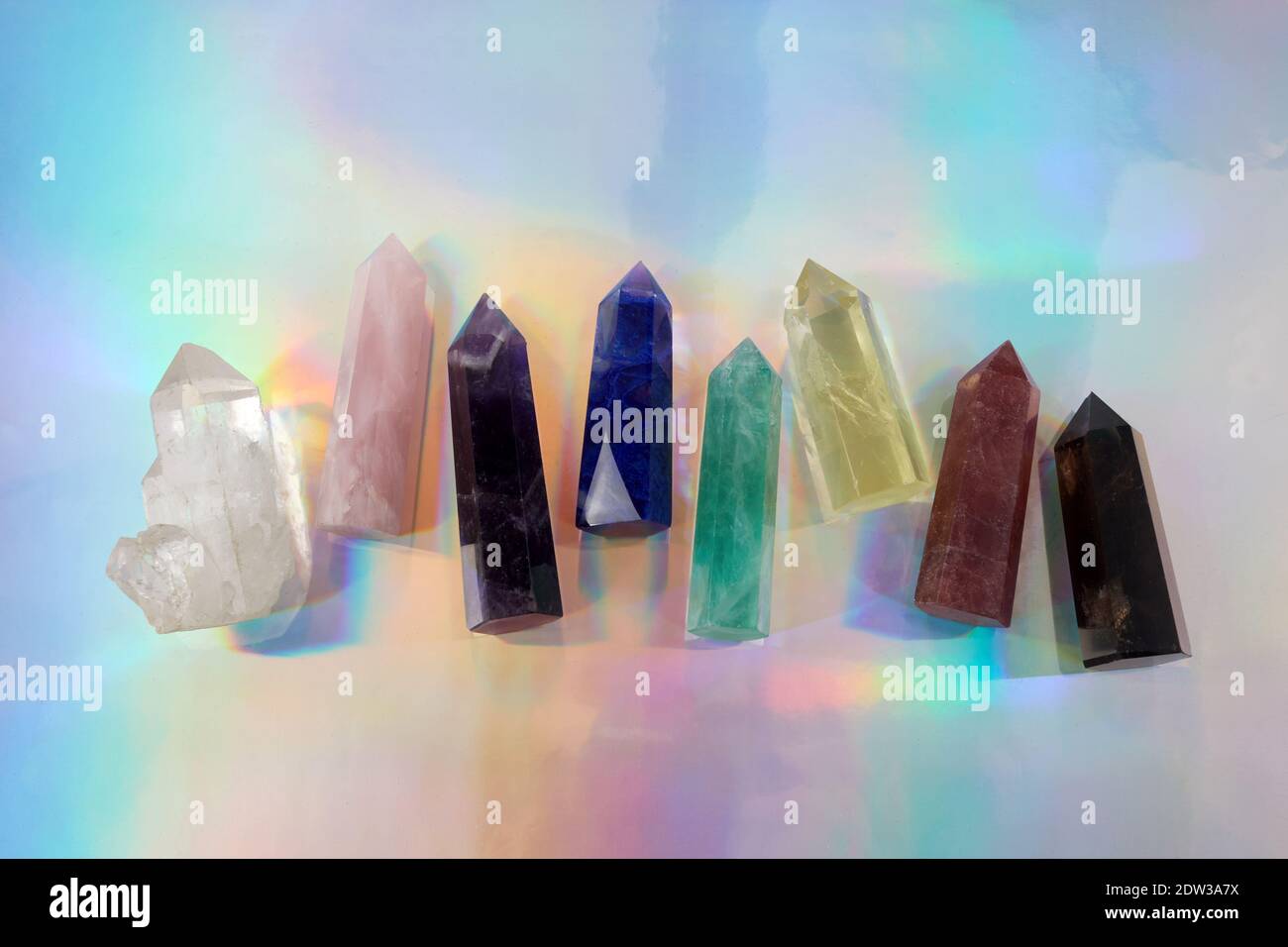 Healing Chakra crystals on halographic background. Meditation, Reiki or ...